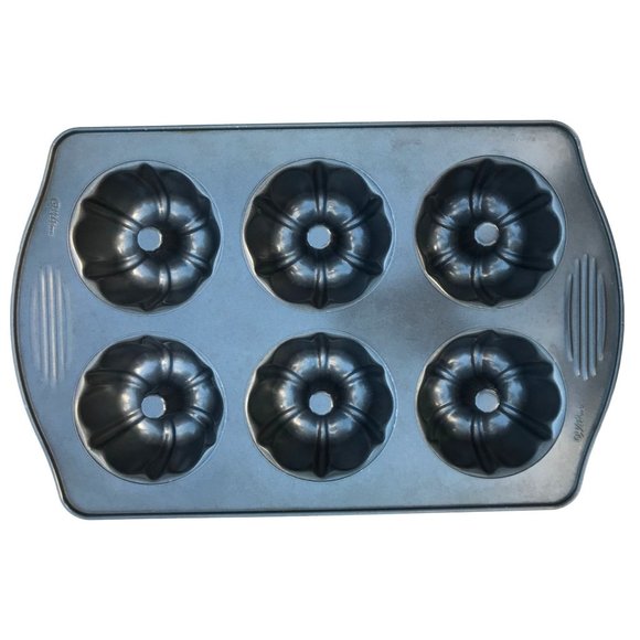 Wilton | Kitchen | Wilton Fluted Tube Mini Bundt Baking Pan Heavy ...